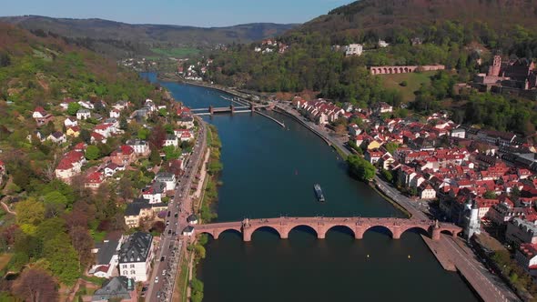 Top view of the embankment of the Neckar River. Bridges, green grass ...