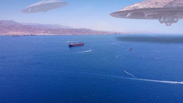 Alien Saucers Over Red sea And Tanker ship, Motion Graphics | VideoHive