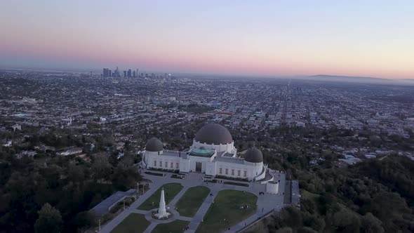 Fast aerial orbit of the Griffith Observatory at night., Stock Footage