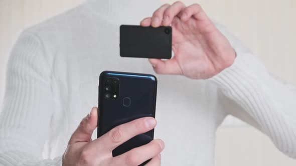 Scanning QR Code with a Modern Cold Crypto Wallet and Smartphone, Stock ...