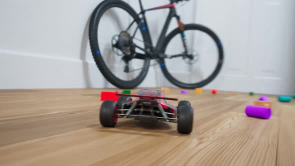 RC car indoor race. Miniature radio-controlled model driving fast in ...