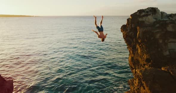 Backflip Cliff Jumping into the Ocean, Stock Footage | VideoHive