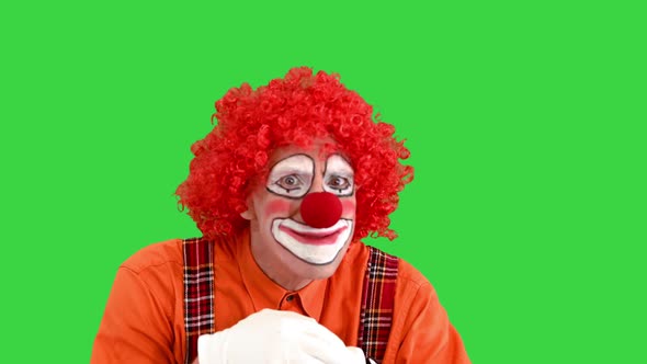 Funny Clown Having Some Hard Thinking on a Green Screen Chroma Key ...