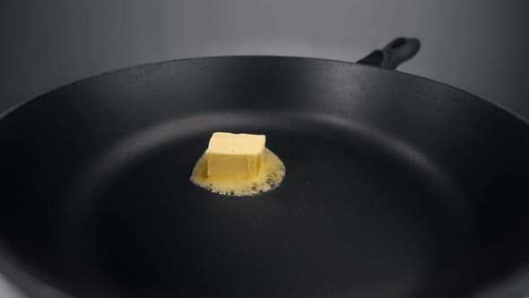 Chef Greases the Hot Pan with Butter, Melting Butter on the Pan, Butter ...