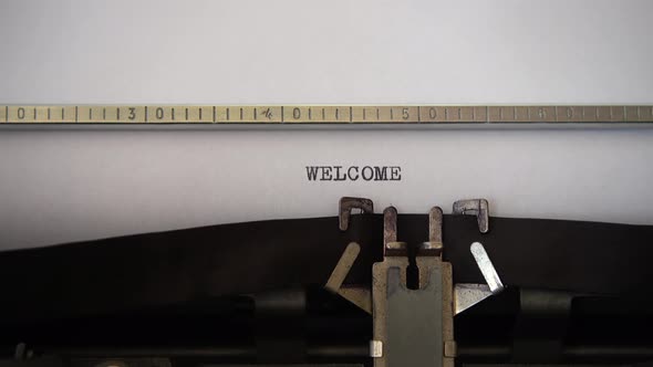 Typing word WELCOME on retro typewriter. Close up., Stock Footage ...