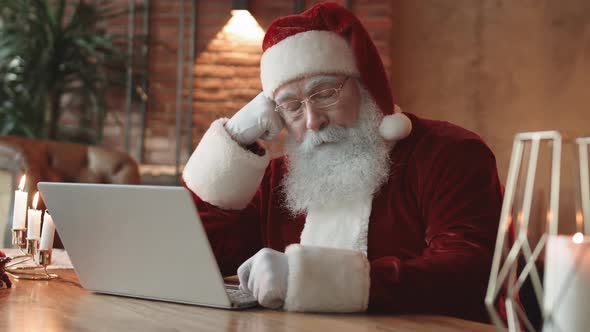 Sleepy Santa Using Computer, Stock Footage | VideoHive