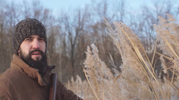 Frustrated Angry Hunter Has Hidden Among the Bushes, Stock Footage