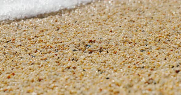 Closeup Slow Motion Footage of Beach of Gravel the Coarse Sand Waves ...