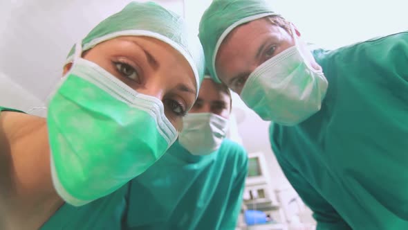 Focus on a surgical team taking off an anesthesia mask, Stock Footage