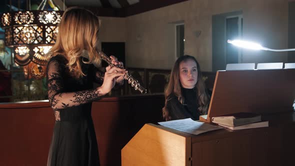 Female Flutist and Organist Playing Music in Church, Stock Footage