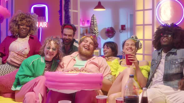 Friends Laughing at Comedy Movie at Watch Party, Stock Footage | VideoHive