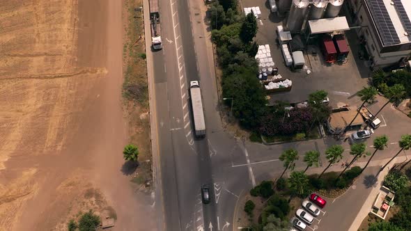 Truck loaded with Shipping container on a rural highway., Stock Footage