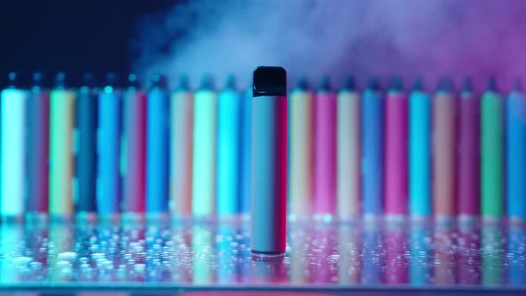 ECigarettes and Vapes with Smoke in Neon Lighting, Stock Footage ...