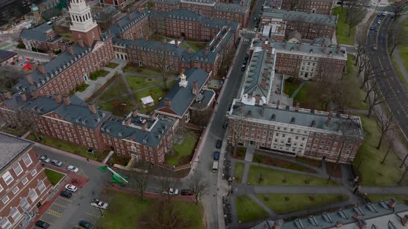 Aerial Ascending Footage of Complex of Historic Red Brick Buildings in ...