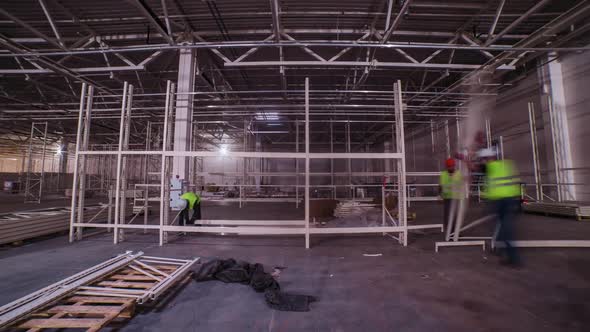 Workers Assemble Carcass for Racks in Plant Warehouse, Stock Footage
