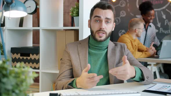Handsome Guy Office Worker Speaking Sitting at Desk During Video Call ...
