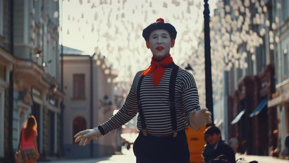 Walking smiling mime on the street, Stock Footage | VideoHive