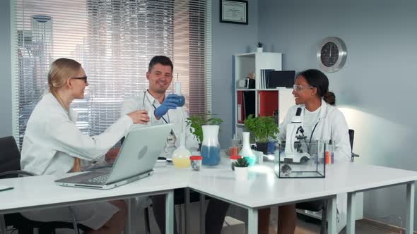 Happy Multiracial Team of Scientists Making Toasts with Dry-ice ...