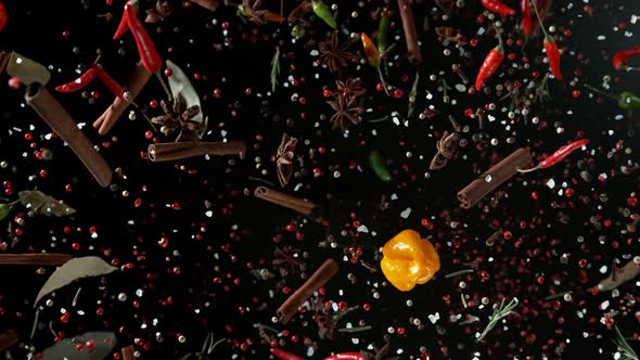 Super Slow Motion Shot of Colorful Seasoning Explosion on Black ...