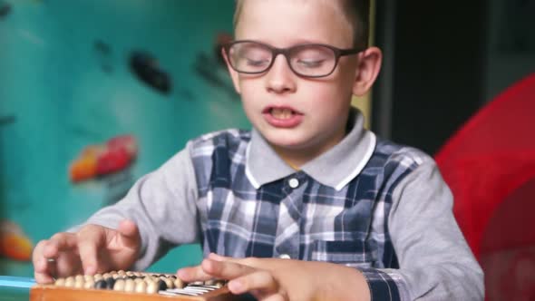 Concept on the theme of the little banker. Caucasian preschooler boy ...