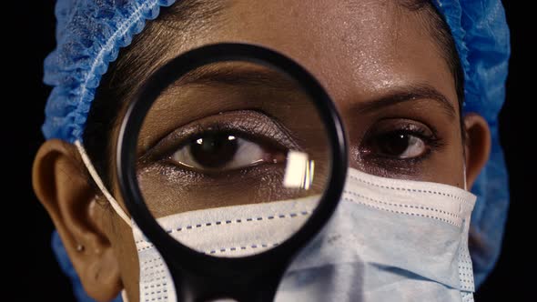 Nurse with Magnifying Glass, Stock Footage | VideoHive
