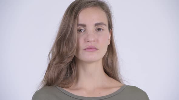 Face of Serious Young Stressed Woman Nodding Head No, Stock Footage