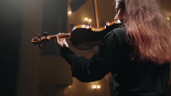 Woman Fiddler is Playing Fiddle in Music Hall or Opera House Portrait ...