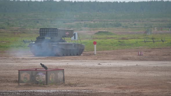 Tank System of Multiple Launch Rocket Launches Moves Around the Range ...