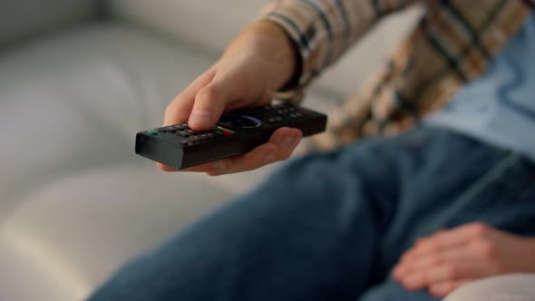 Closeup Hand Zapping Tv Resting at Home, Stock Footage | VideoHive