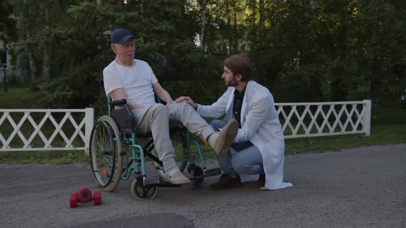 It's Hard to Move Legs to Old Man on Wheelchair, Stock Footage | VideoHive