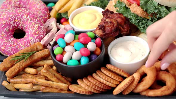 Fast food platter. Junk food concept. Unhealthy food for the heart ...