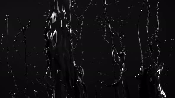 Super Slow Motion Shot of Black Glossy Paint Splash at 1000 Fps, Stock ...