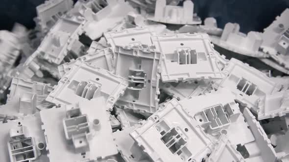 Plastic Electrical Outlet Components Manufactured in Bulk Pile, Stock ...