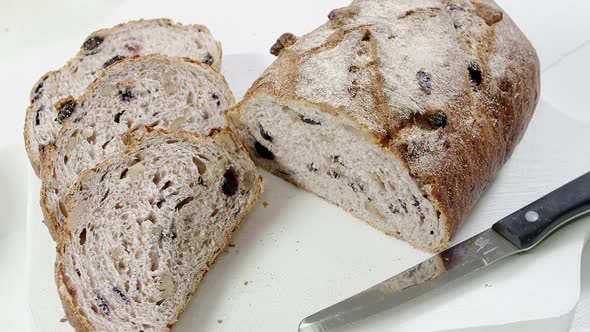 Closeup of Sliced Rye Raisin Bread on the White Cutting Board, Stock ...
