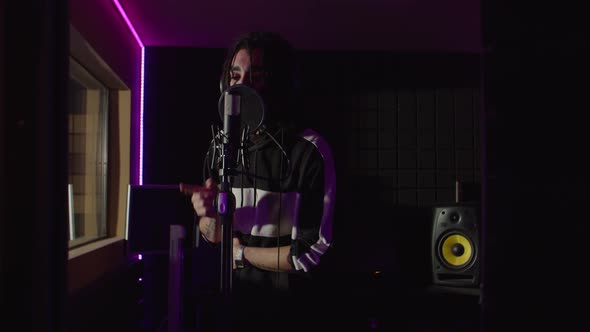 Stylish Attractive Male Hip Hop Artist Rapping New Hit Song Into ...