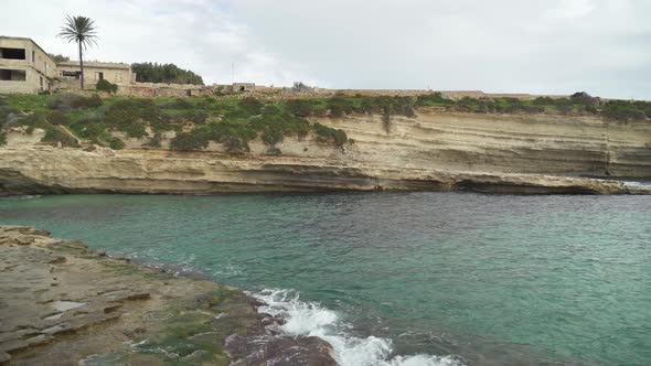Turquoise Colour Water Stone Beach Il-Kalanka in Malta with Limestone ...