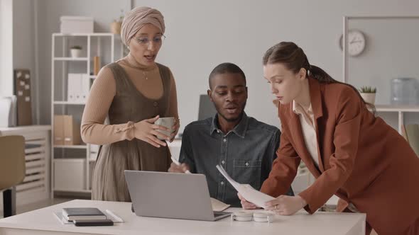 Office Workers Having Discussion at Workplace, Stock Footage | VideoHive