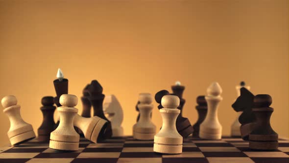 Super Slow Motion Chess Pieces Fall on the Chessboard, Stock Footage