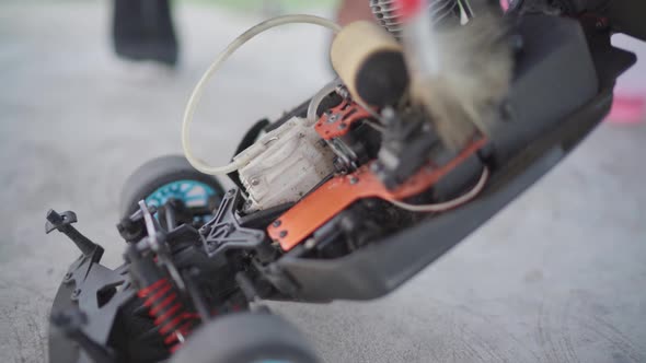 Cleaning the dust and dirt that inside of a remote controlled car with ...