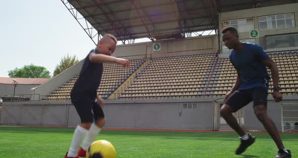 Diverse Father and Son Playing Football on Stadium, Stock Footage ...