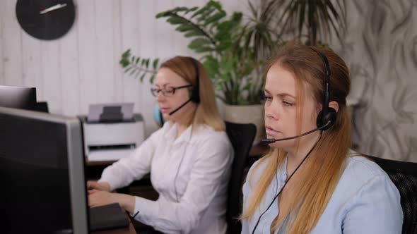 An Angry Woman in a Call Center Office She is Talking to a Disgruntled ...