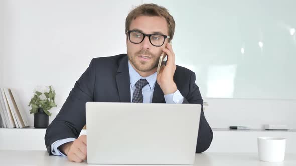 Businessman Talking on Phone Negotiating with Customer, Stock Footage