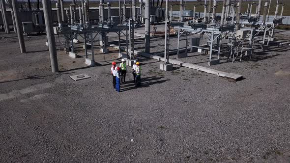 Group of Engineers on Transformer Platform of Station, Stock Footage