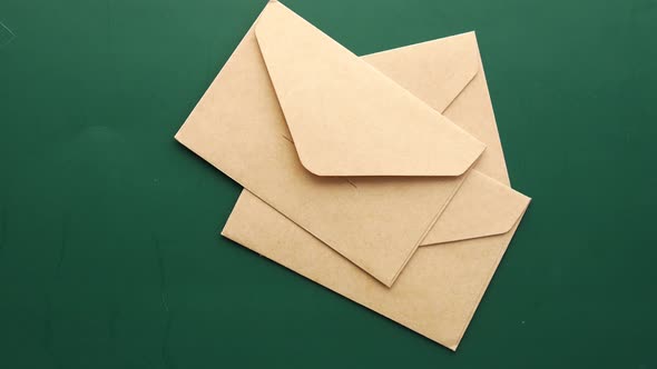 Envelope Dropping on Color Background Top View, Stock Footage | VideoHive