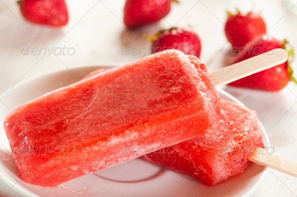 Cold Organic Frozen Strawberry Fruit Popsicle Stock Photo by bhofack2