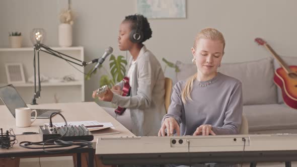 Female Duo Recording Song at Studio, Stock Footage | VideoHive