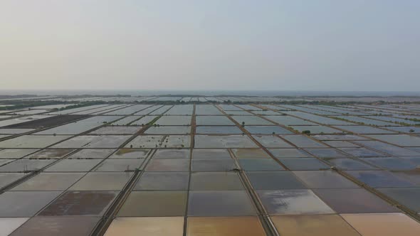 Aerial top view of natural sea salt ponds. Farm field outdoor. Material ...