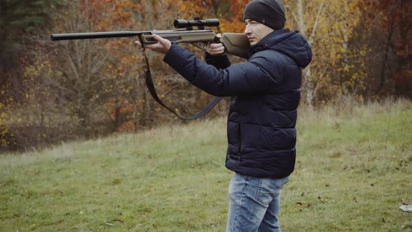Man Shooting Gun in Forest, Stock Footage | VideoHive