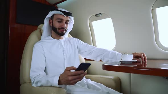 Arabian man flying on his Private jet to dubai., Stock Footage | VideoHive