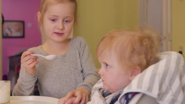 Little Sister Caring For Brother, Stock Footage | VideoHive